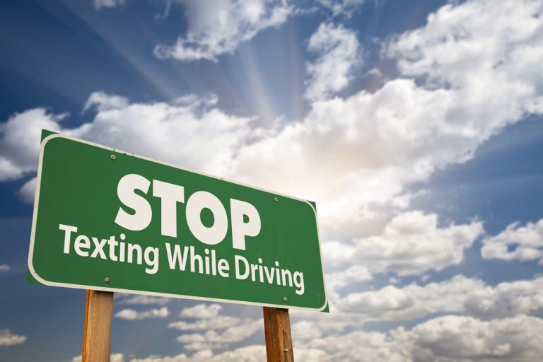 Using Your Mobile Phone While Driving: Laws You Should Know